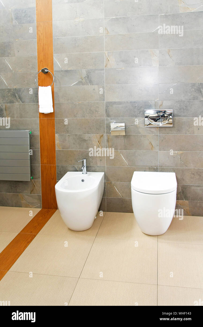 Interior of toilet with marble wall tiles Stock Photo - Alamy