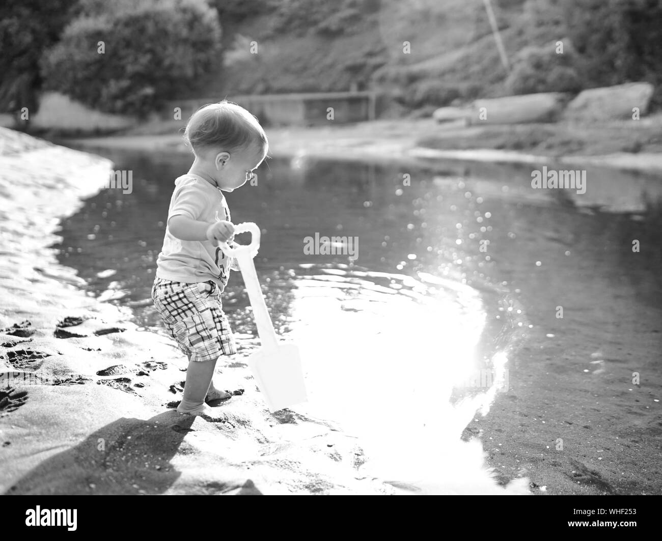 Full length boy side view Black and White Stock Photos & Images - Alamy