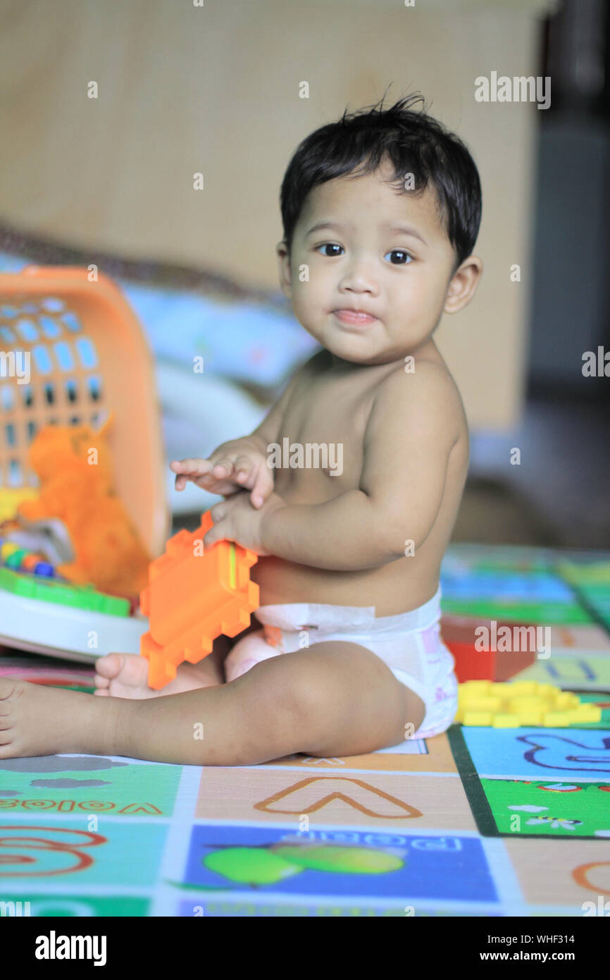 Cute boy with diaper hi-res stock photography and images - Alamy