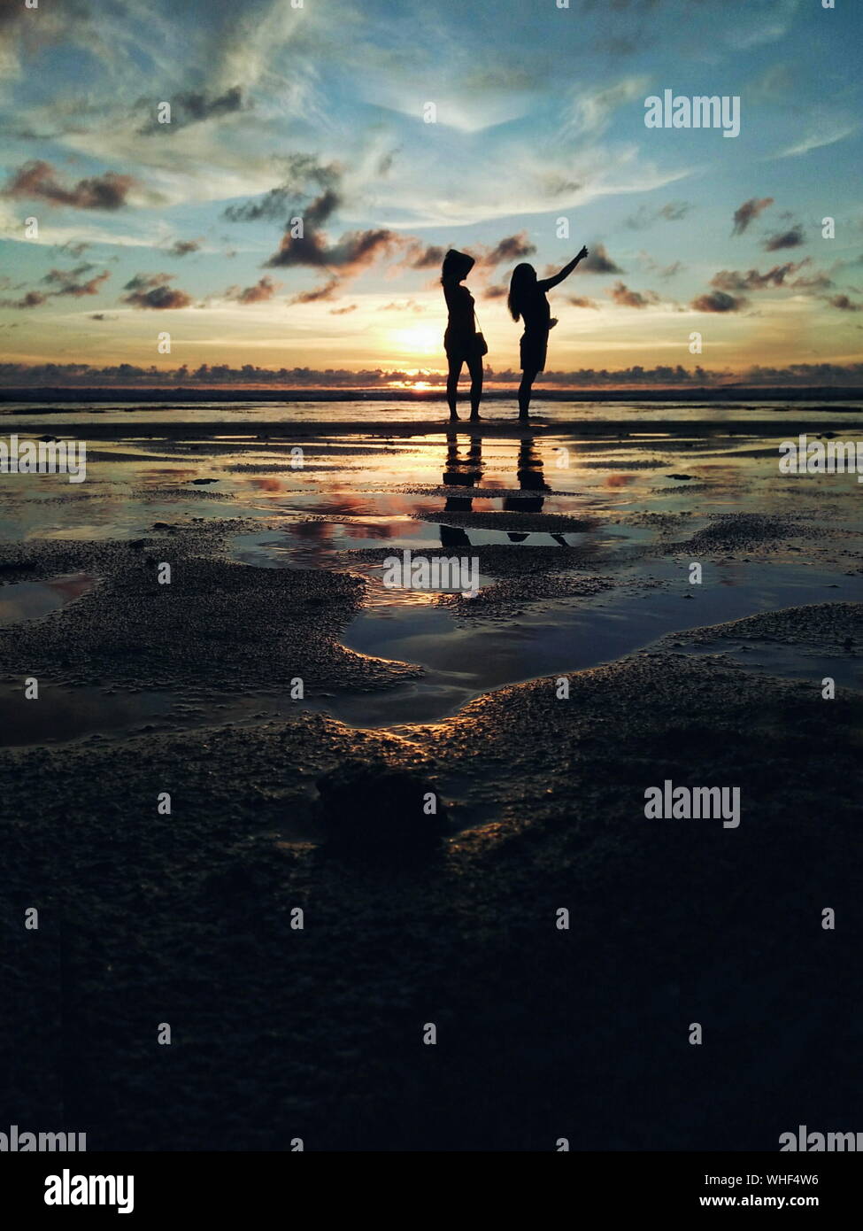 Two women at the beach two women at the beach hi-res stock photography ...