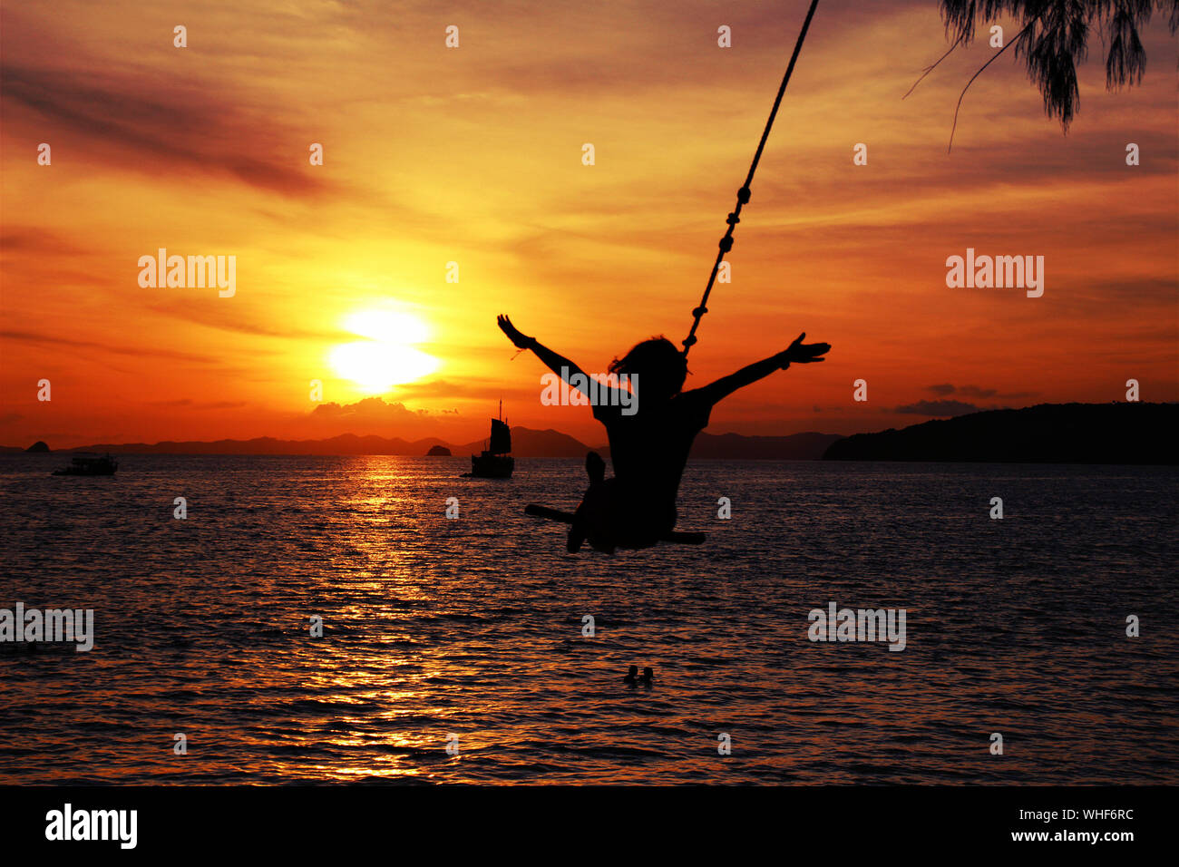 Swinging Over Water High Resolution Stock Photography and Images - Alamy