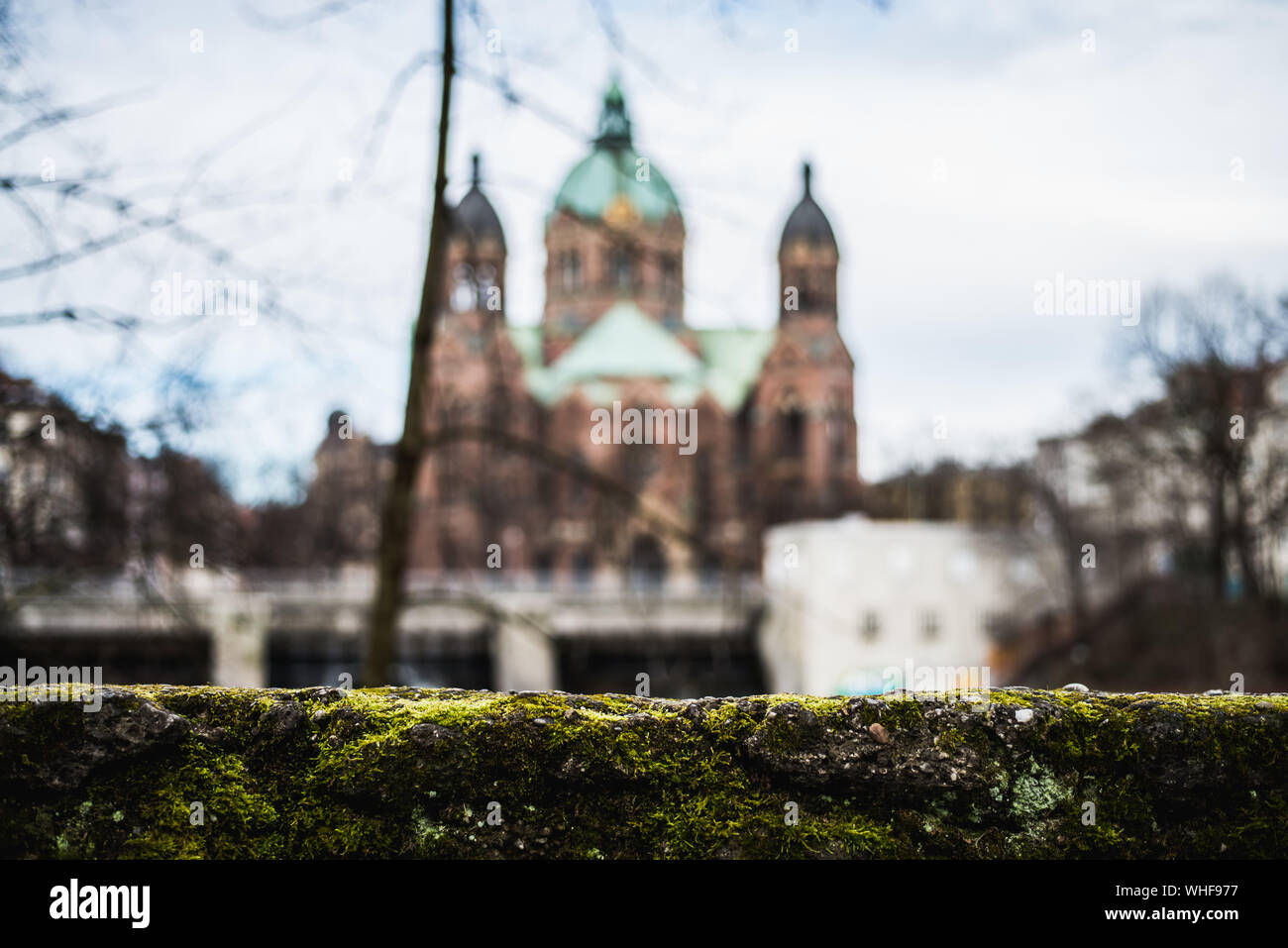 Moss Covered Retaining Wall With Cathedral Seen In Background Stock ...