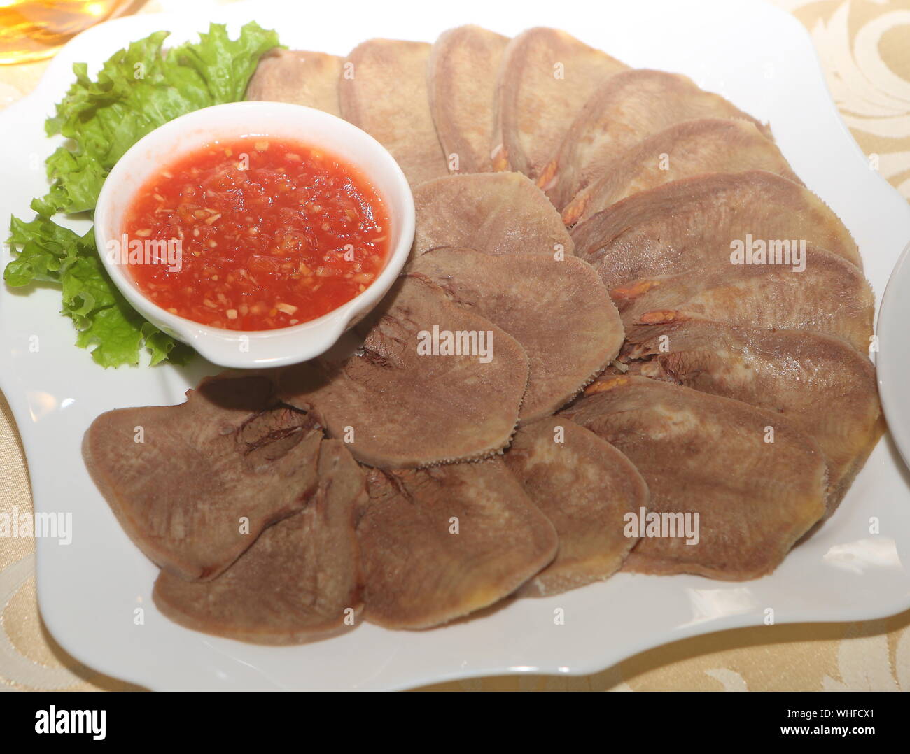 Boiled tongue with sauce Stock Photo - Alamy