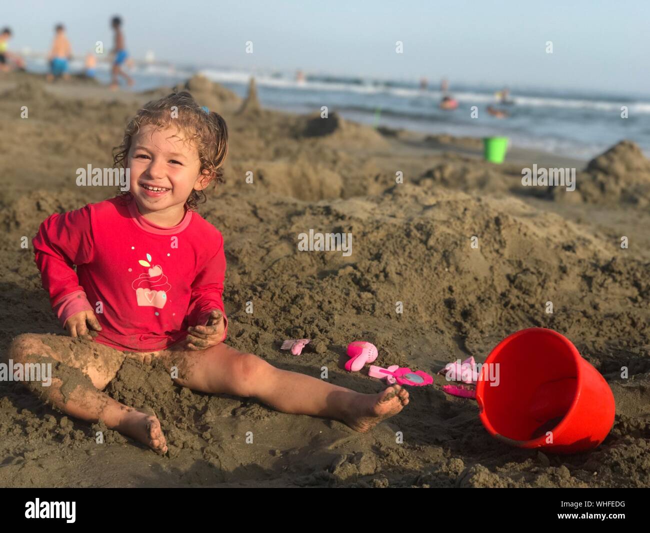 Boy playing sand pail shovel hi-res stock photography and images - Alamy