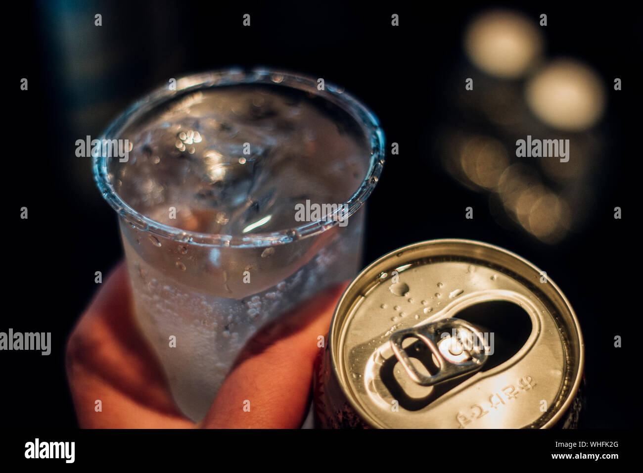 Hand holding can alcohol hi-res stock photography and images - Alamy