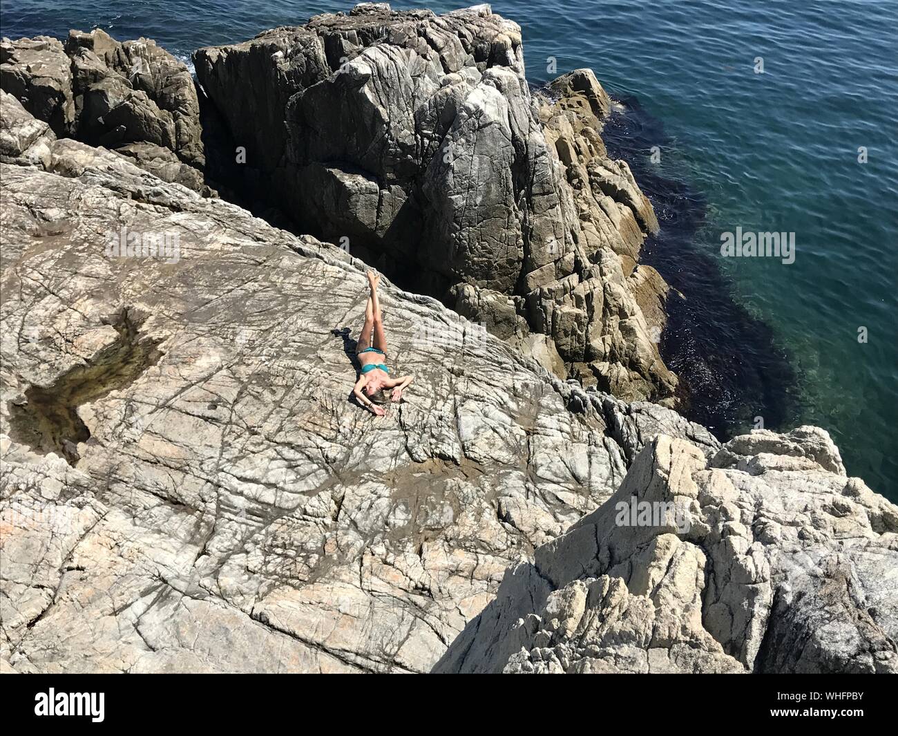 Woman lying on back in sea hi-res stock photography and images - Alamy