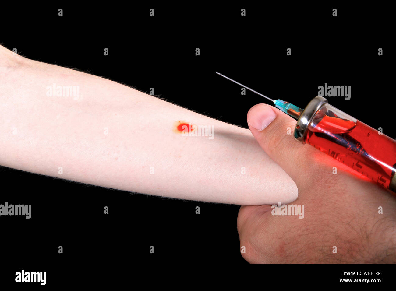 Detail of human hand getting an injection Stock Photo - Alamy