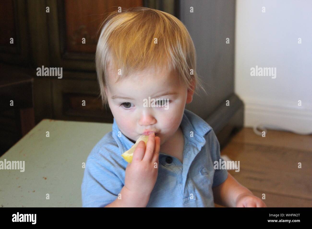 Lemon eating hi-res stock photography and images - Alamy