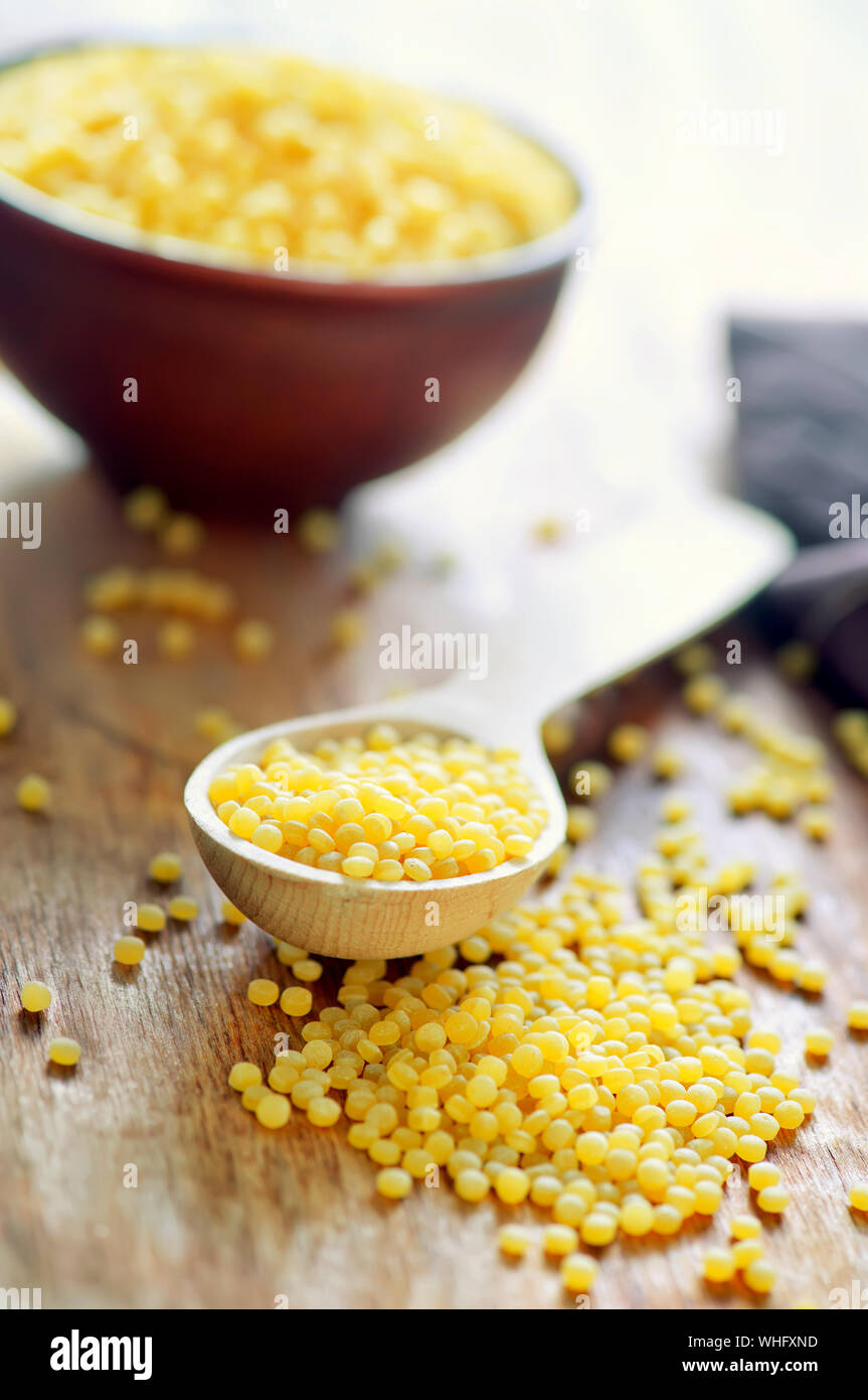 raw ptitim in bowl and on a table Stock Photo - Alamy