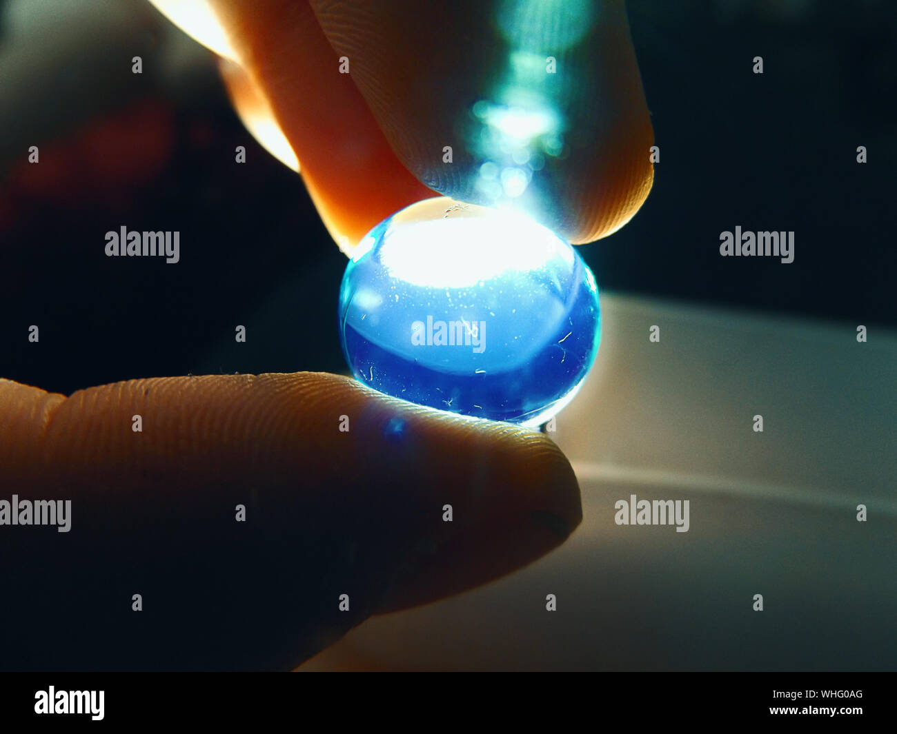 Holding marbles hi-res stock photography and images - Alamy