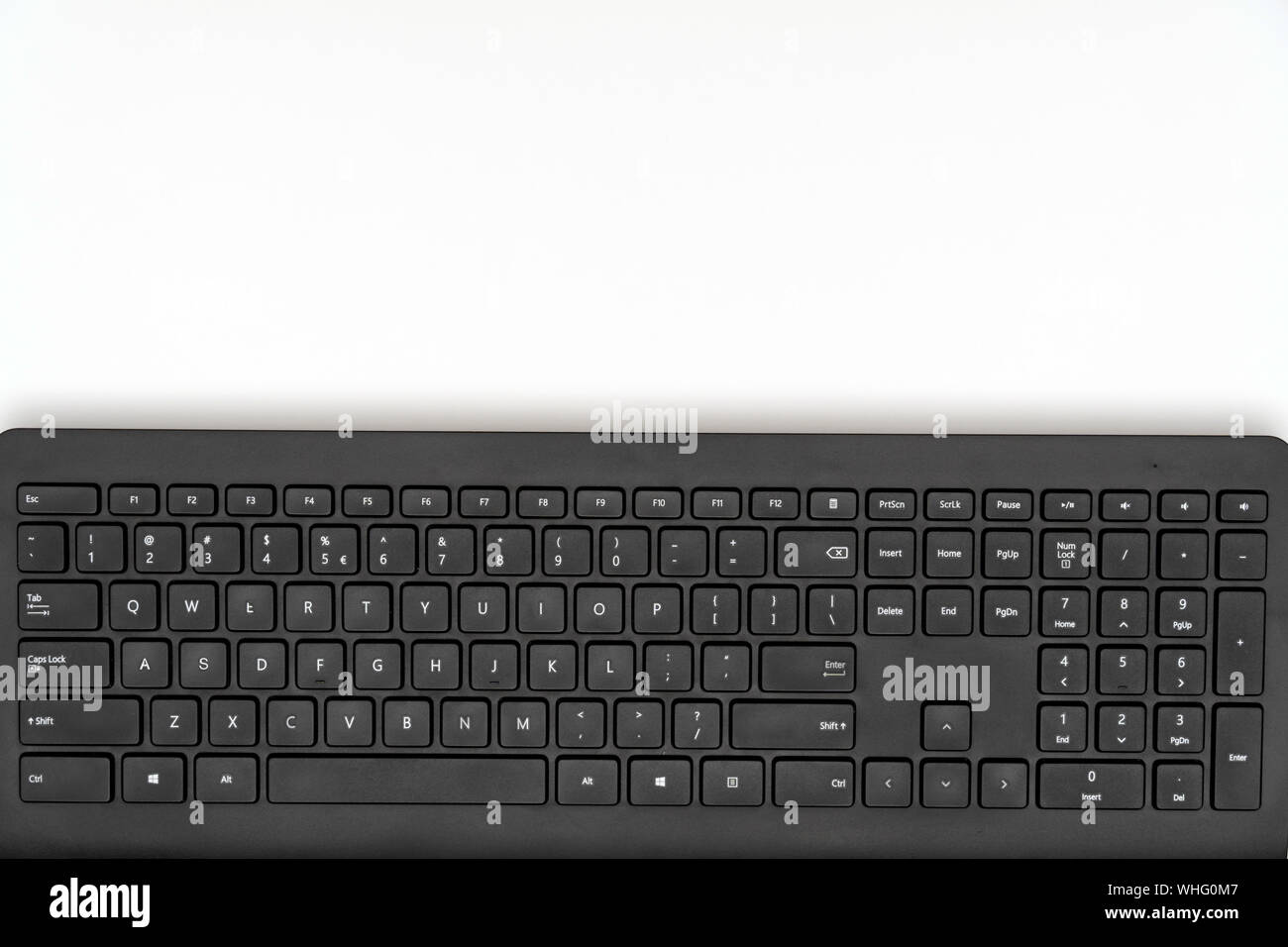 Black keyboard on white background, top view Stock Photo - Alamy
