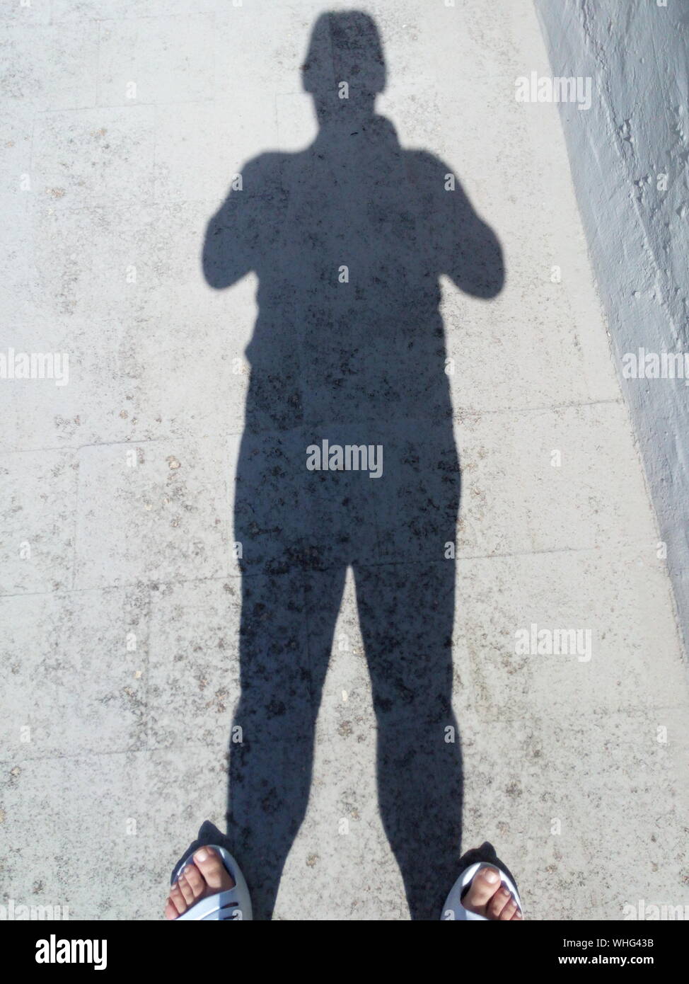 Shadow pavement man hi-res stock photography and images - Alamy