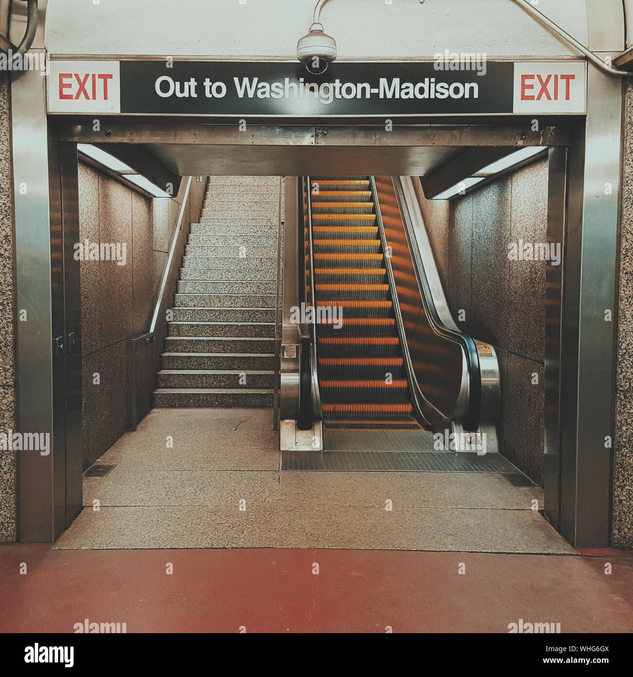 Exit Sign Leading Towards Steps And Escalator In Underground Subway ...