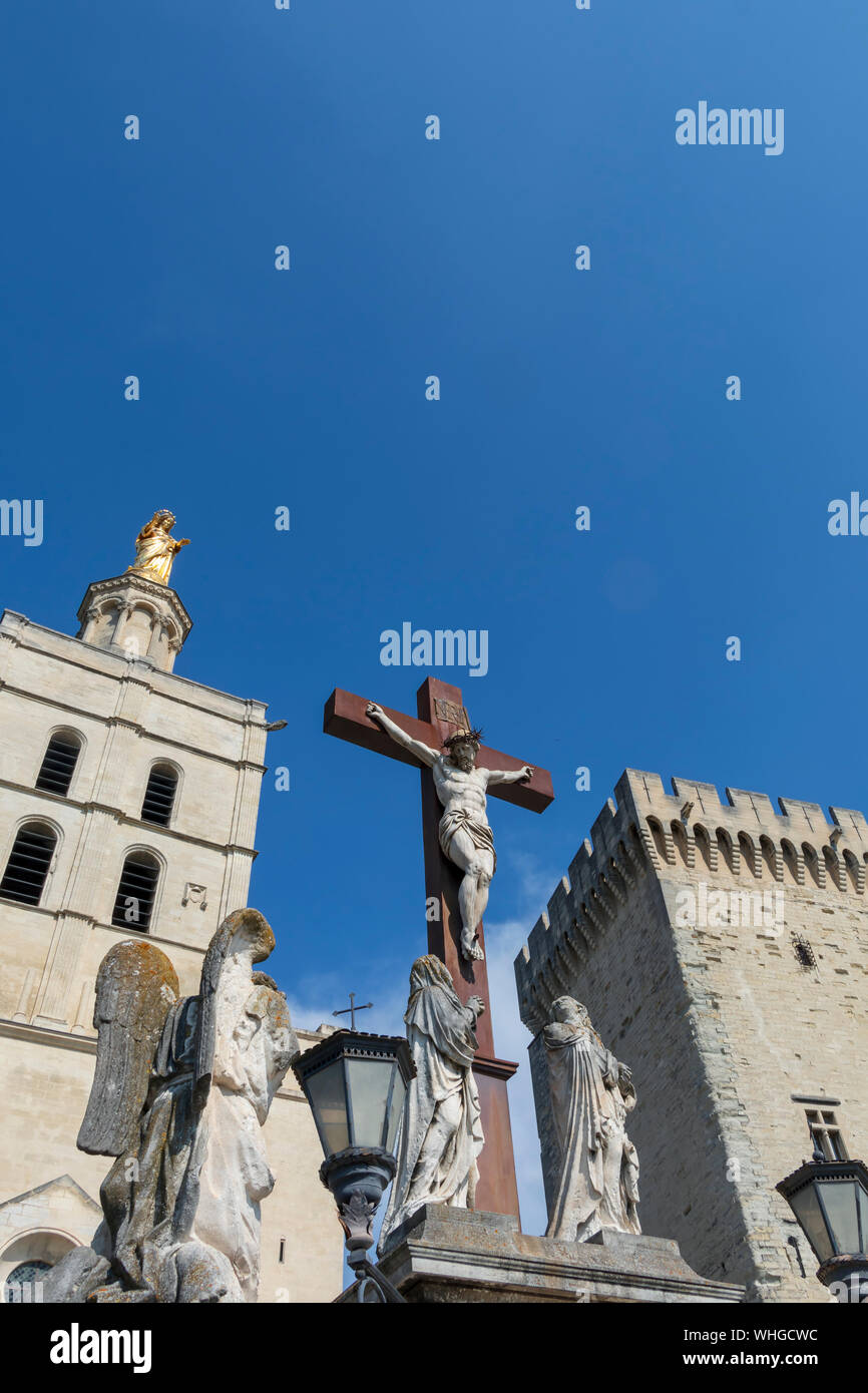 Jesus Christ on the Cross in front of Avignon Cathedral, summer day ...