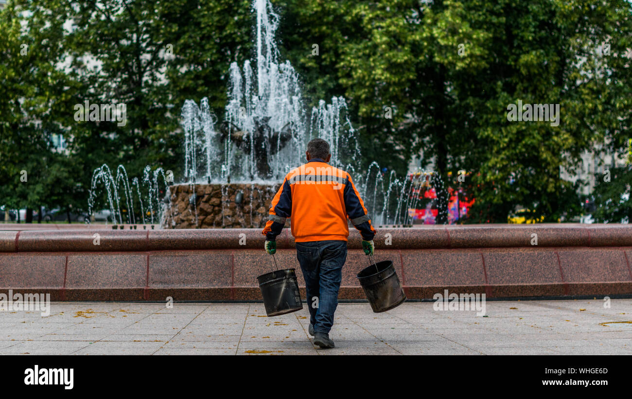 Carrying buckets of water hi-res stock photography and images - Alamy