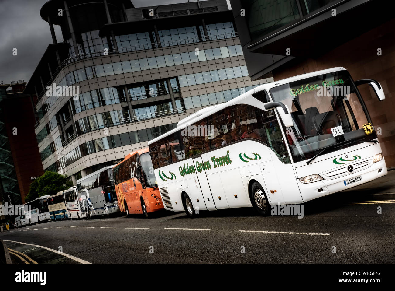 Long line of coaches Stock Photo - Alamy