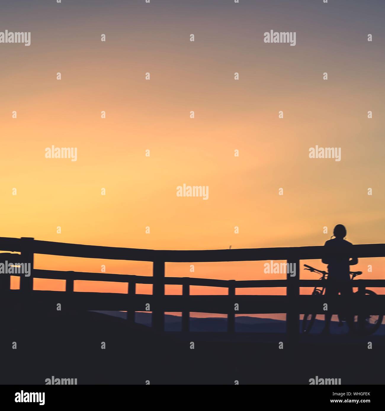Man Standing Bridge Sunset High Resolution Stock Photography and Images ...