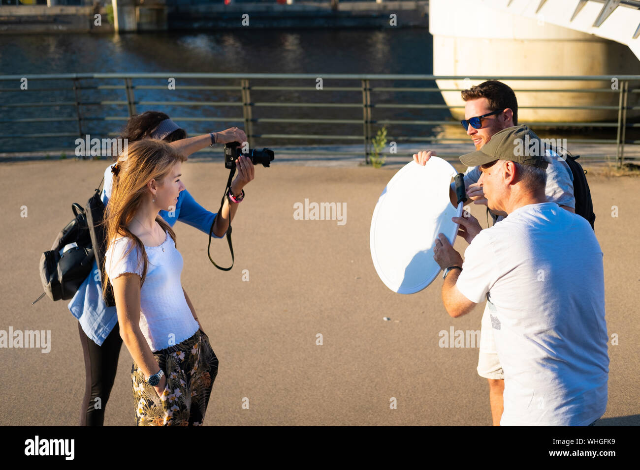 Model poses for photography team Stock Photo - Alamy