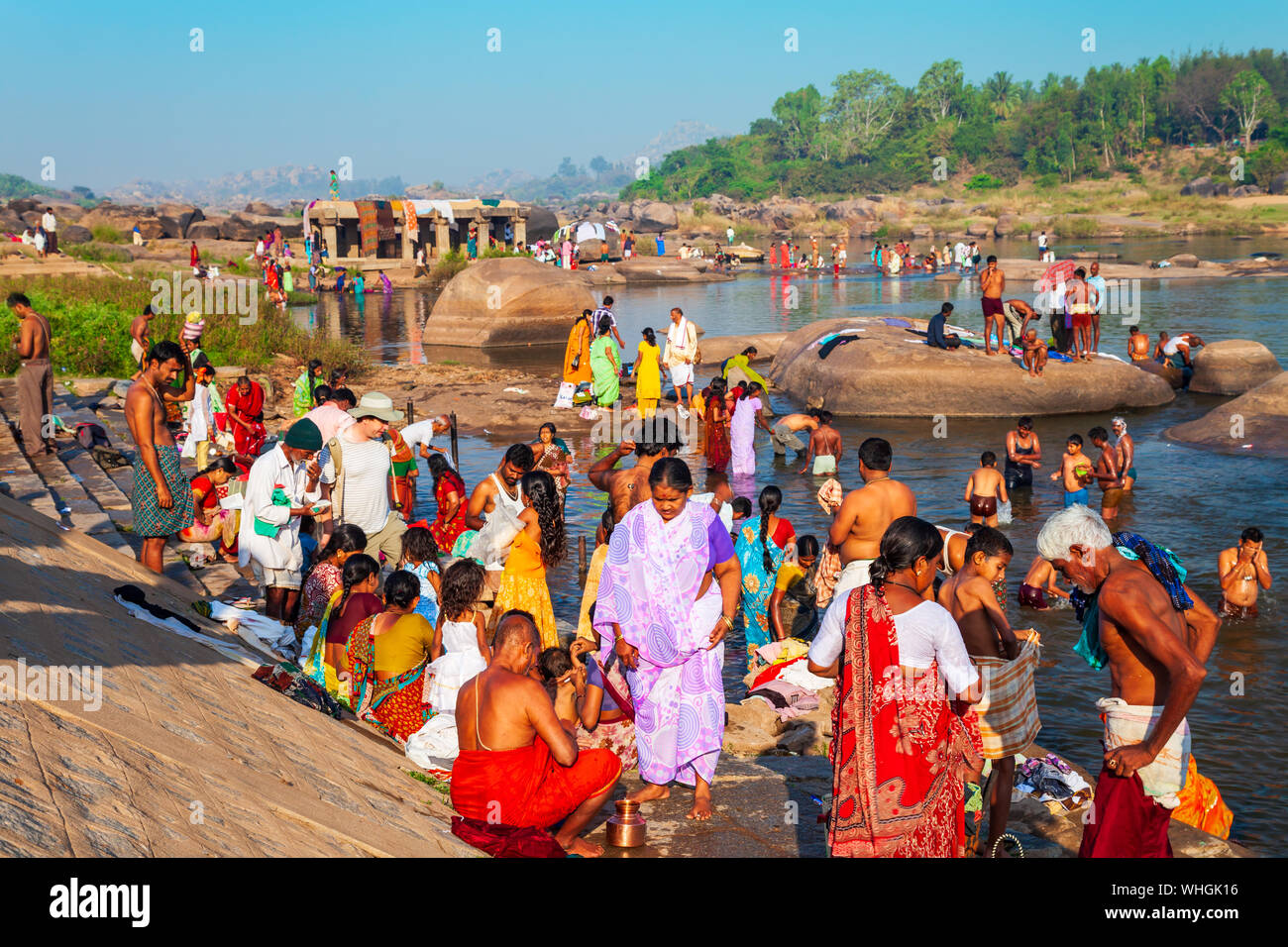 Indian men bathing in ganges hi-res stock photography and images - Alamy