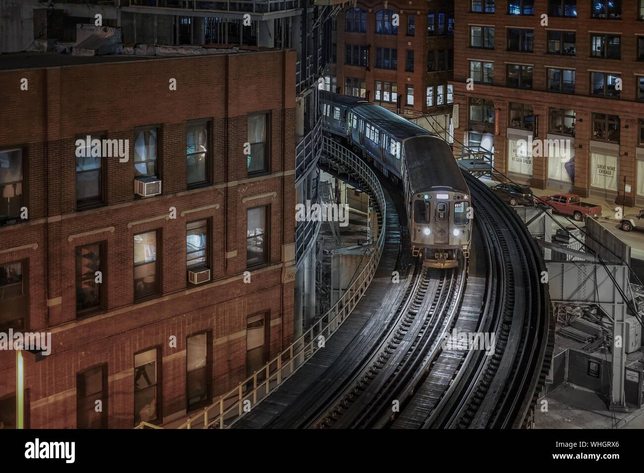 Train through buildings hi-res stock photography and images - Alamy