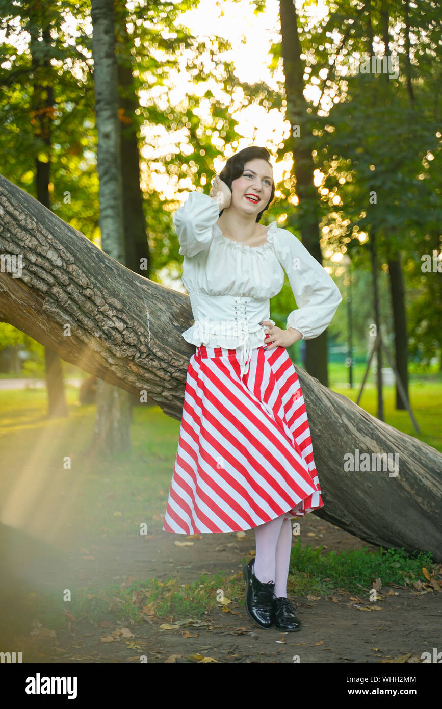 cute fashion lady in summer dress posing in the summer city park Stock ...