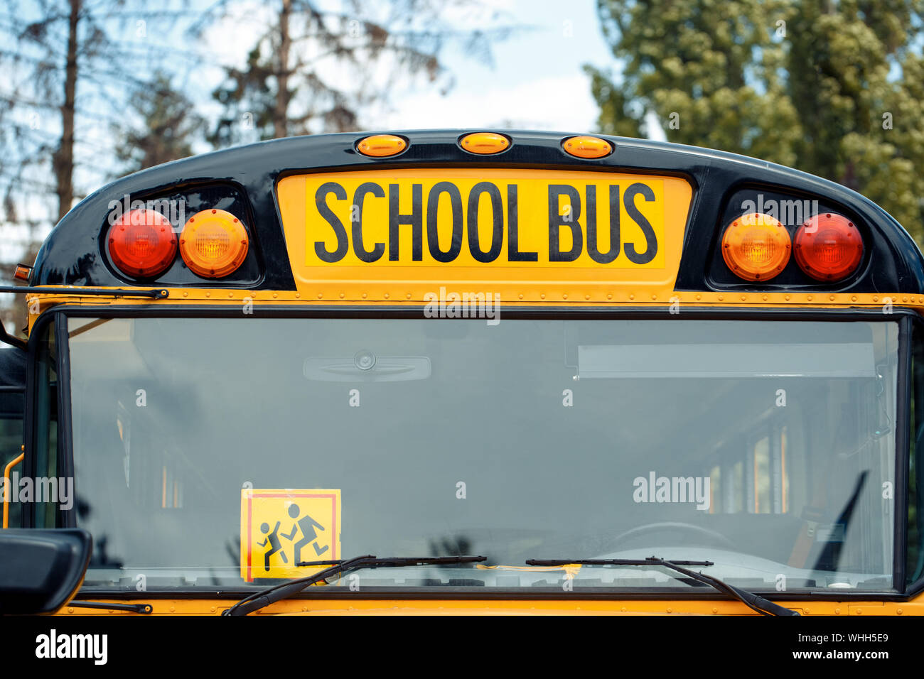 School bus sign above front window close-up Stock Photo - Alamy