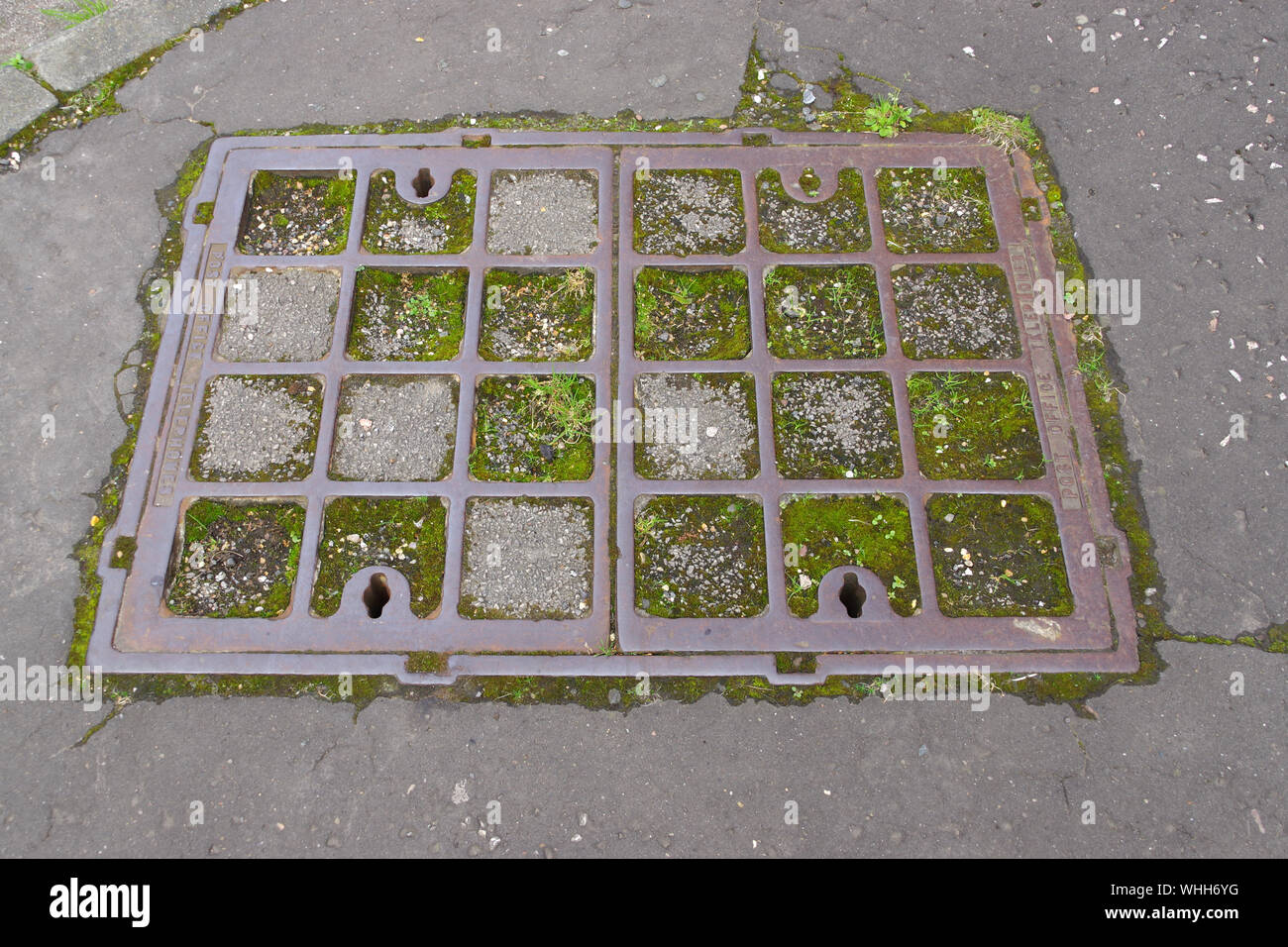 Very old Post Office Telephones service cover on the pavement in ...