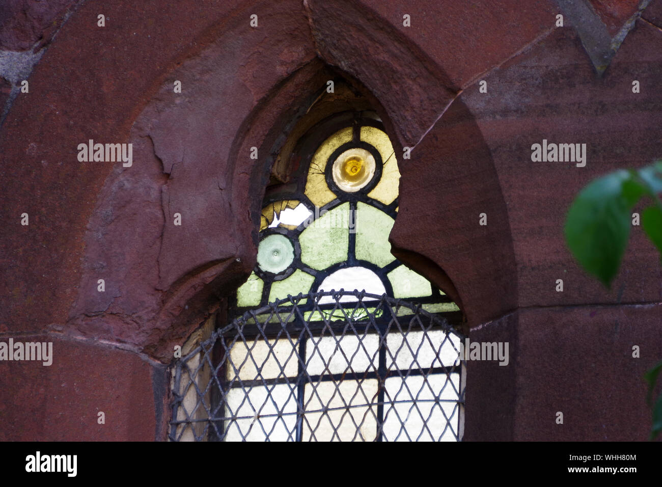 Broken stained glass window in an abandoned church Stock Photo - Alamy