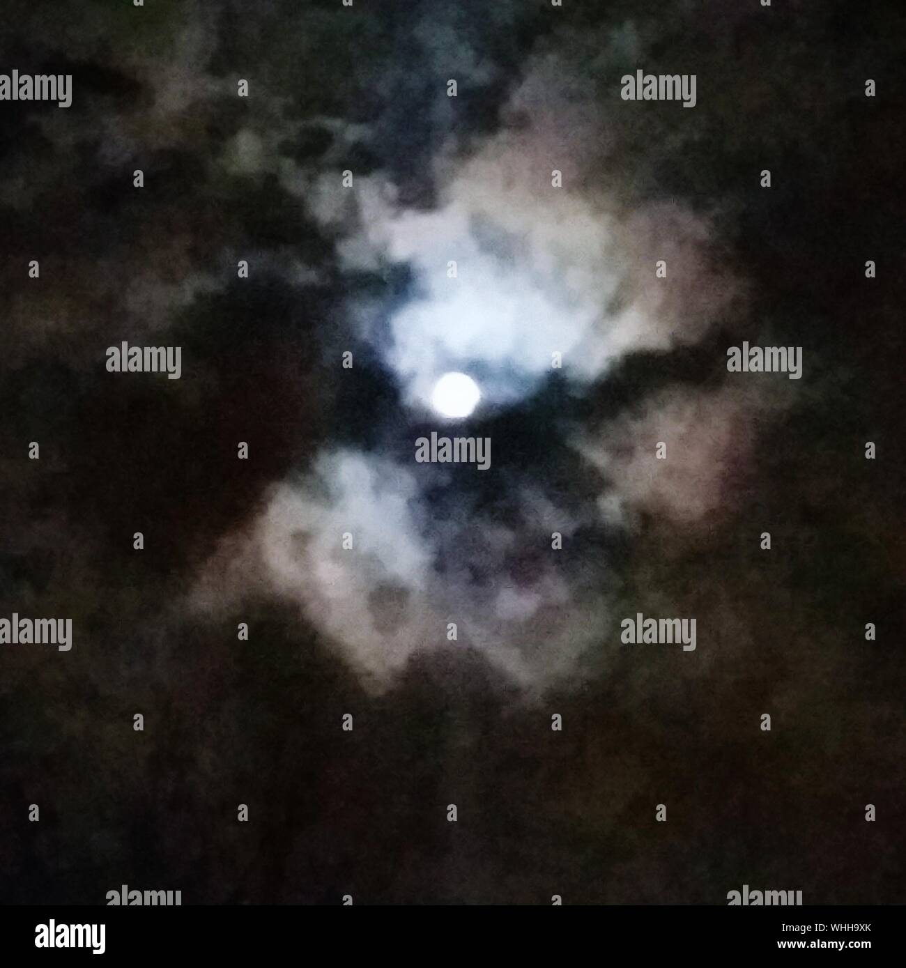 Full moon behind clouds night hi-res stock photography and images - Alamy