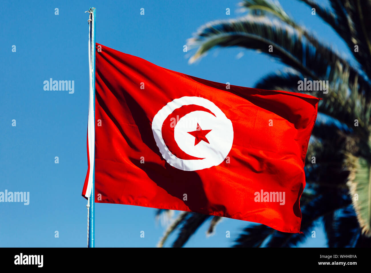 Tunisian flag blue sky hi-res stock photography and images - Alamy