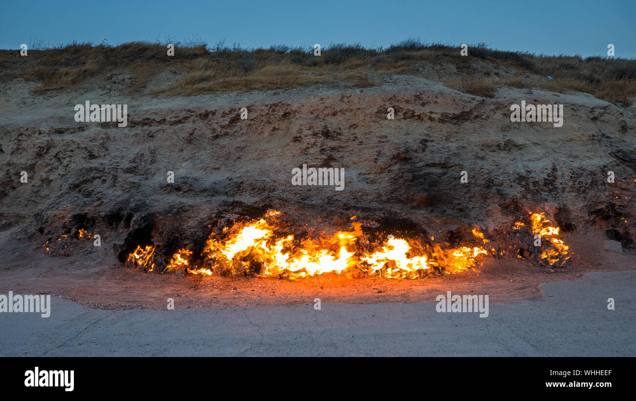 Natural gas fire blazing from the soil, Yanar Dag, Azerbaijan Stock ...