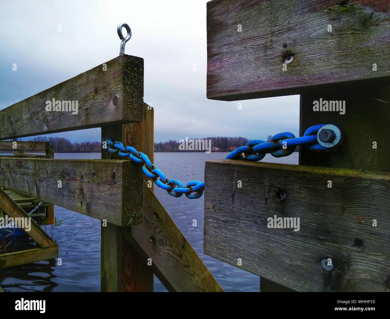 Close-up Of Blue Chain On Railing Stock Photo - Alamy