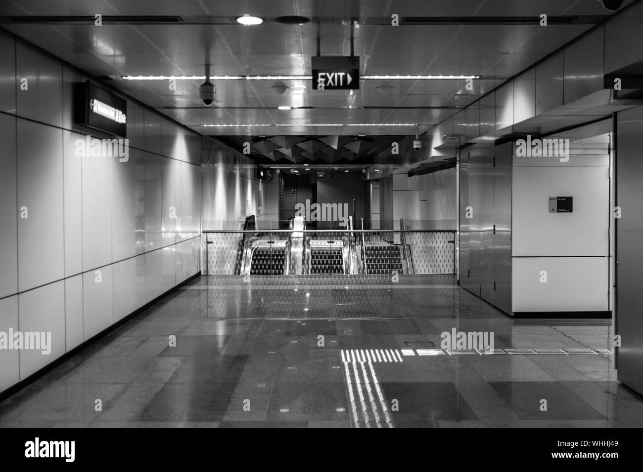 Exit sign hanging on ceiling hi-res stock photography and images - Alamy