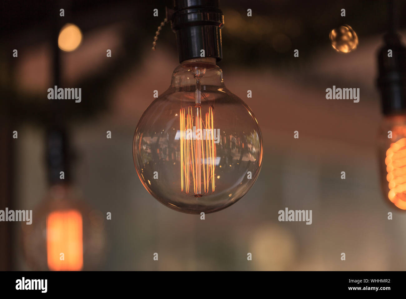 Light bulb lit up hi-res stock photography and images - Alamy