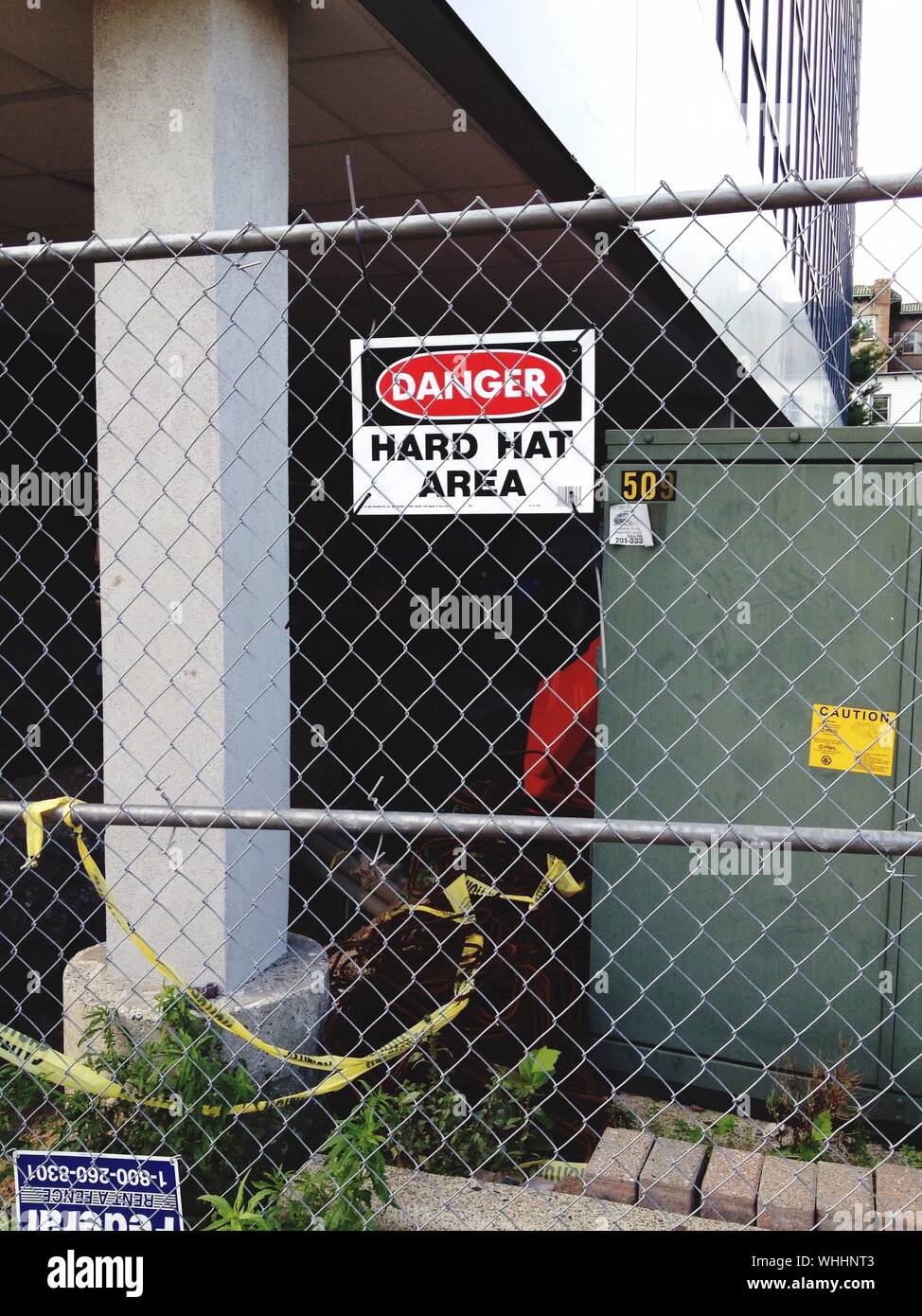 Warning sign on security fence hi-res stock photography and images - Alamy