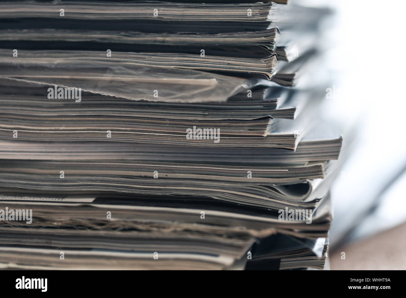 A stack of magazines, close-up macro filled the frame. A background for ...