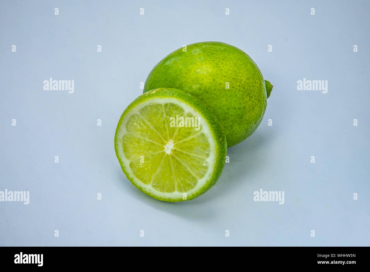 Limes isolated on white background for border design with copy space ...