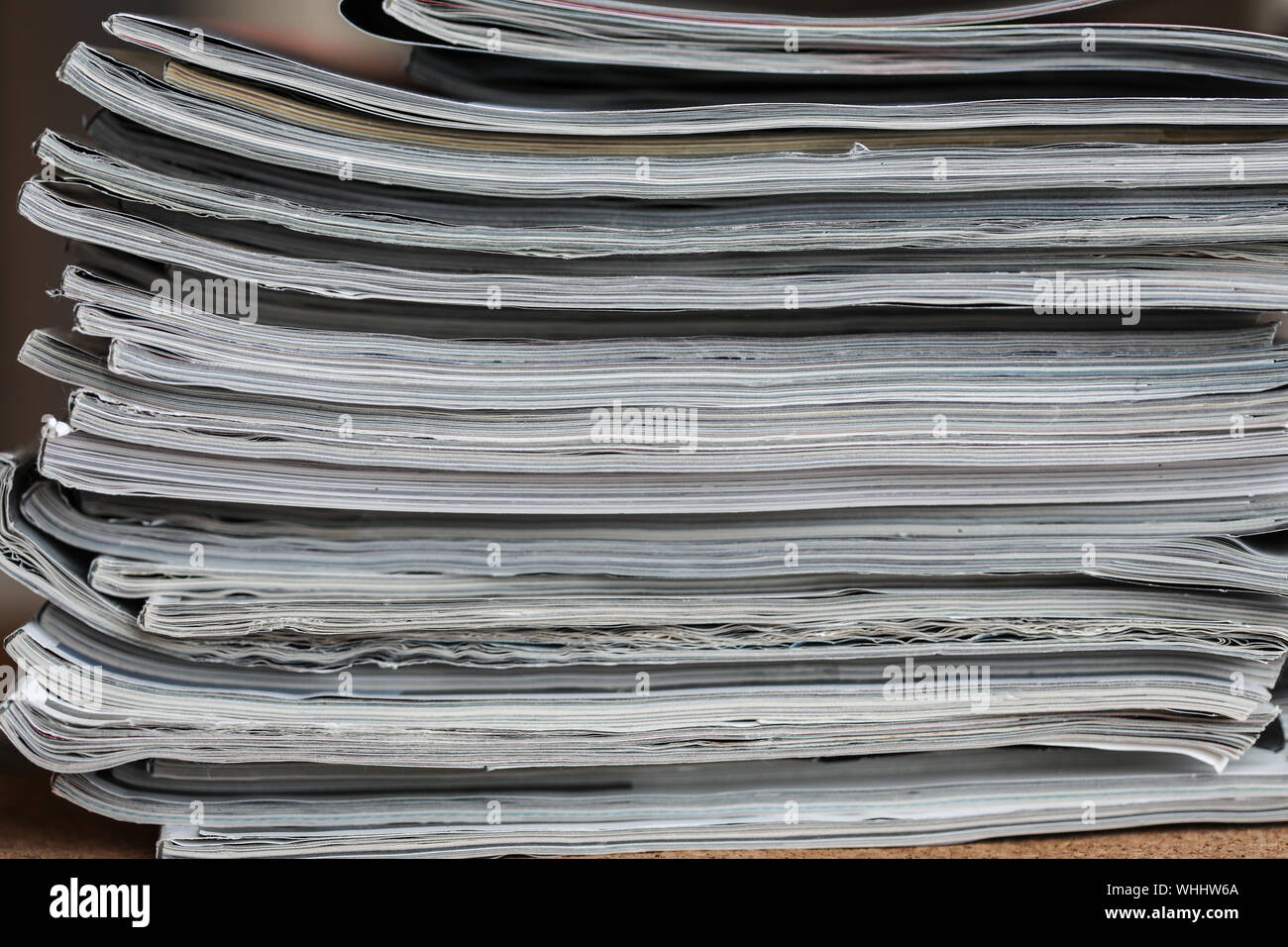 A stack of magazines, close-up macro filled the frame. A background for ...