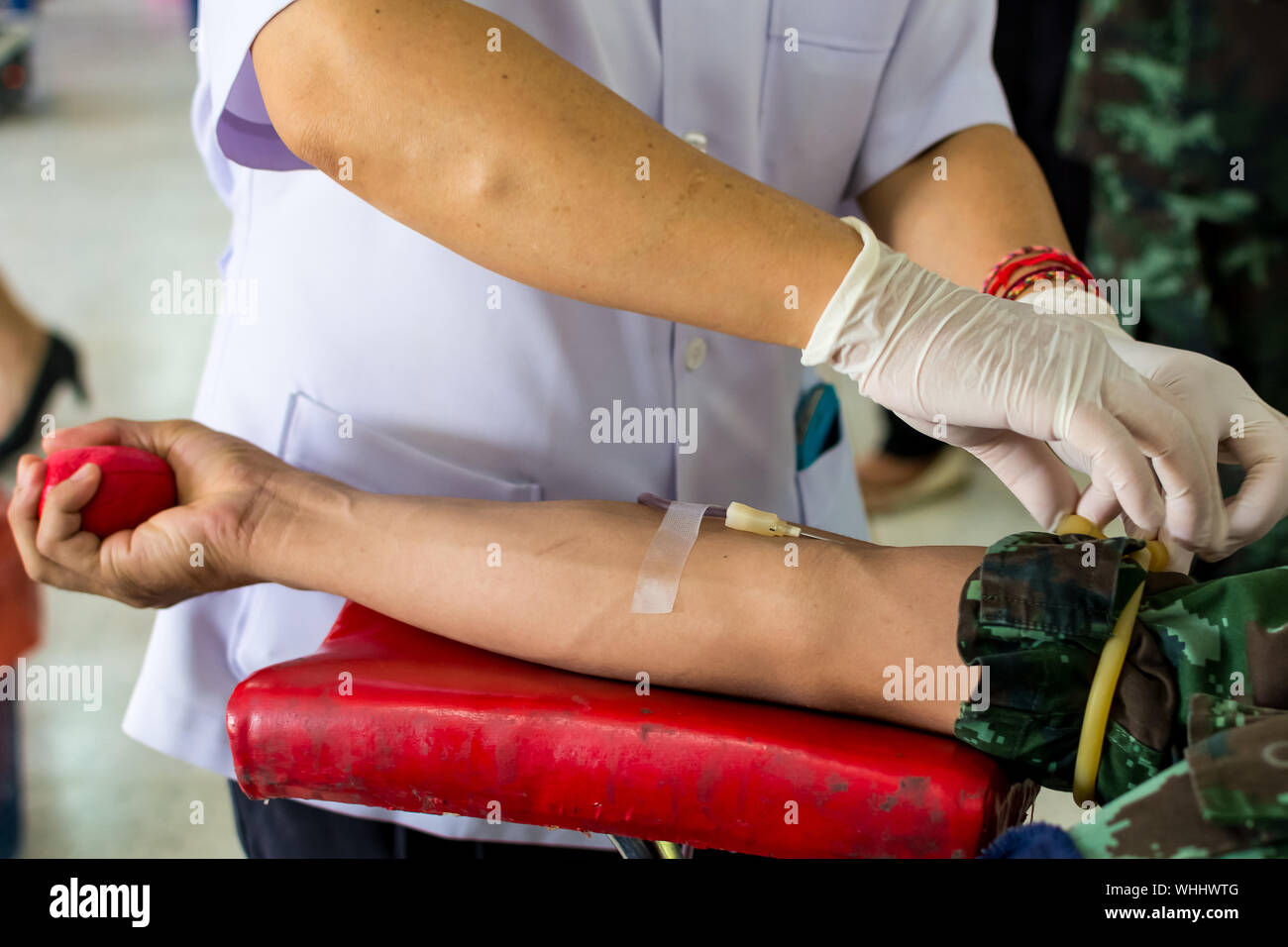 Nurse hand on patient hi-res stock photography and images - Alamy