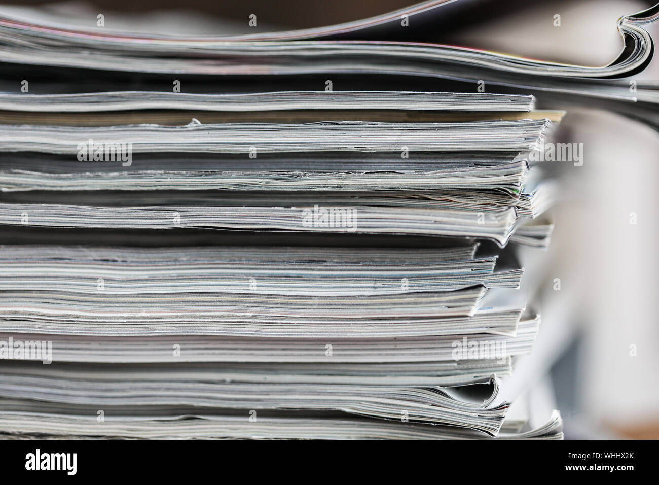 A stack of magazines, close-up macro filled the frame. A background for ...