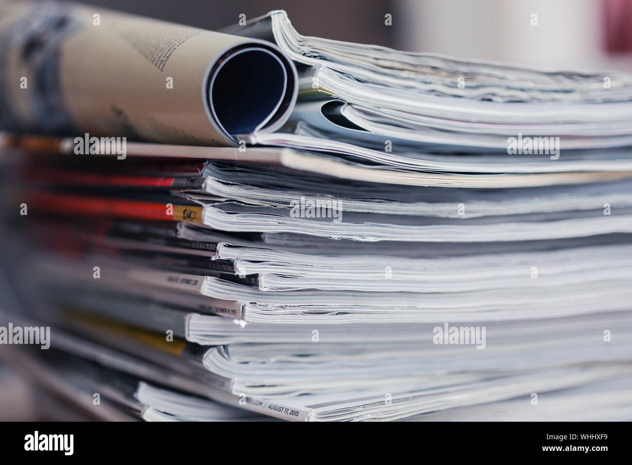 A stack of magazines, close-up macro filled the frame. A background for ...