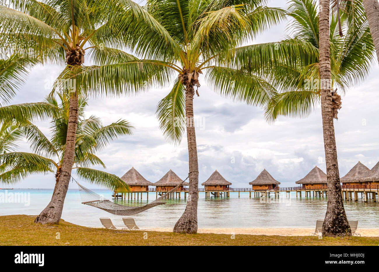 Beach resort at a lagoon on Tuamotu Island, French Polynesia Stock ...