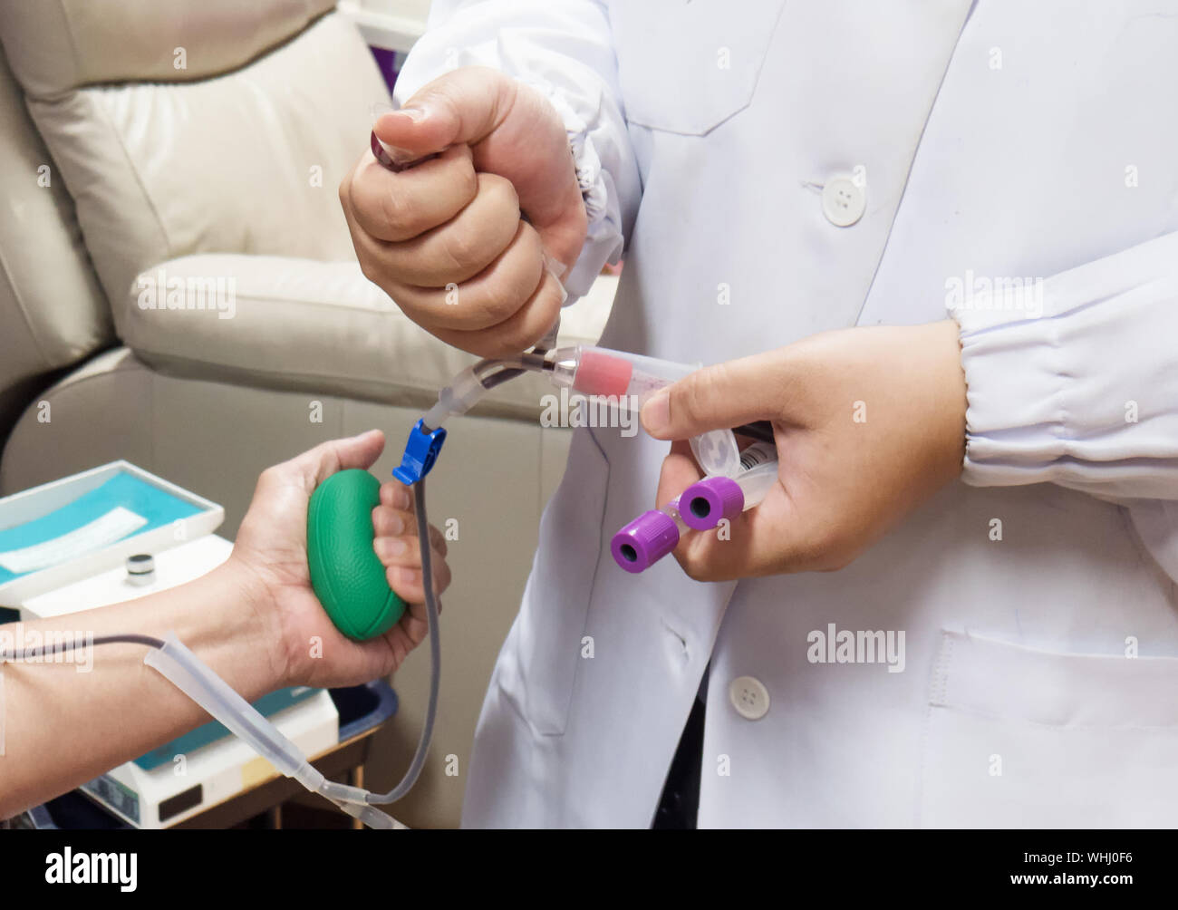 Collecting blood sample hi-res stock photography and images - Alamy