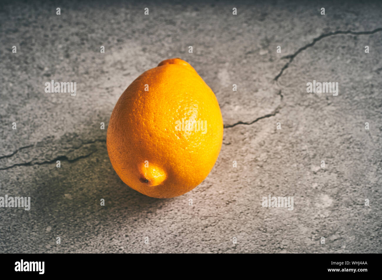 Fresh lemon isolated in marble stone Stock Photo - Alamy