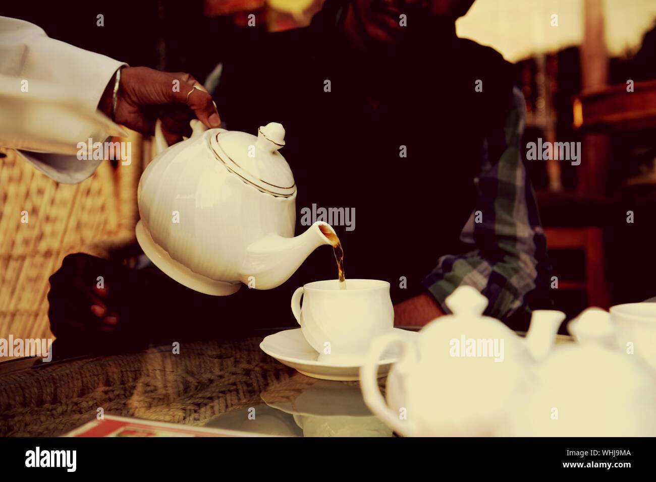 Poring tea hi-res stock photography and images - Alamy