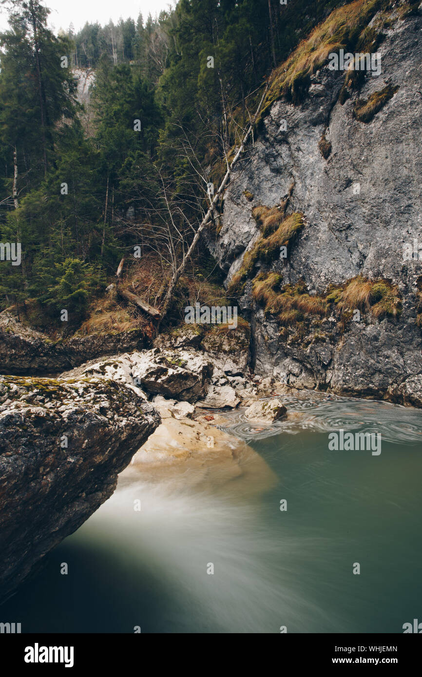 View Of Water Flowing Through Rock Stock Photo - Alamy