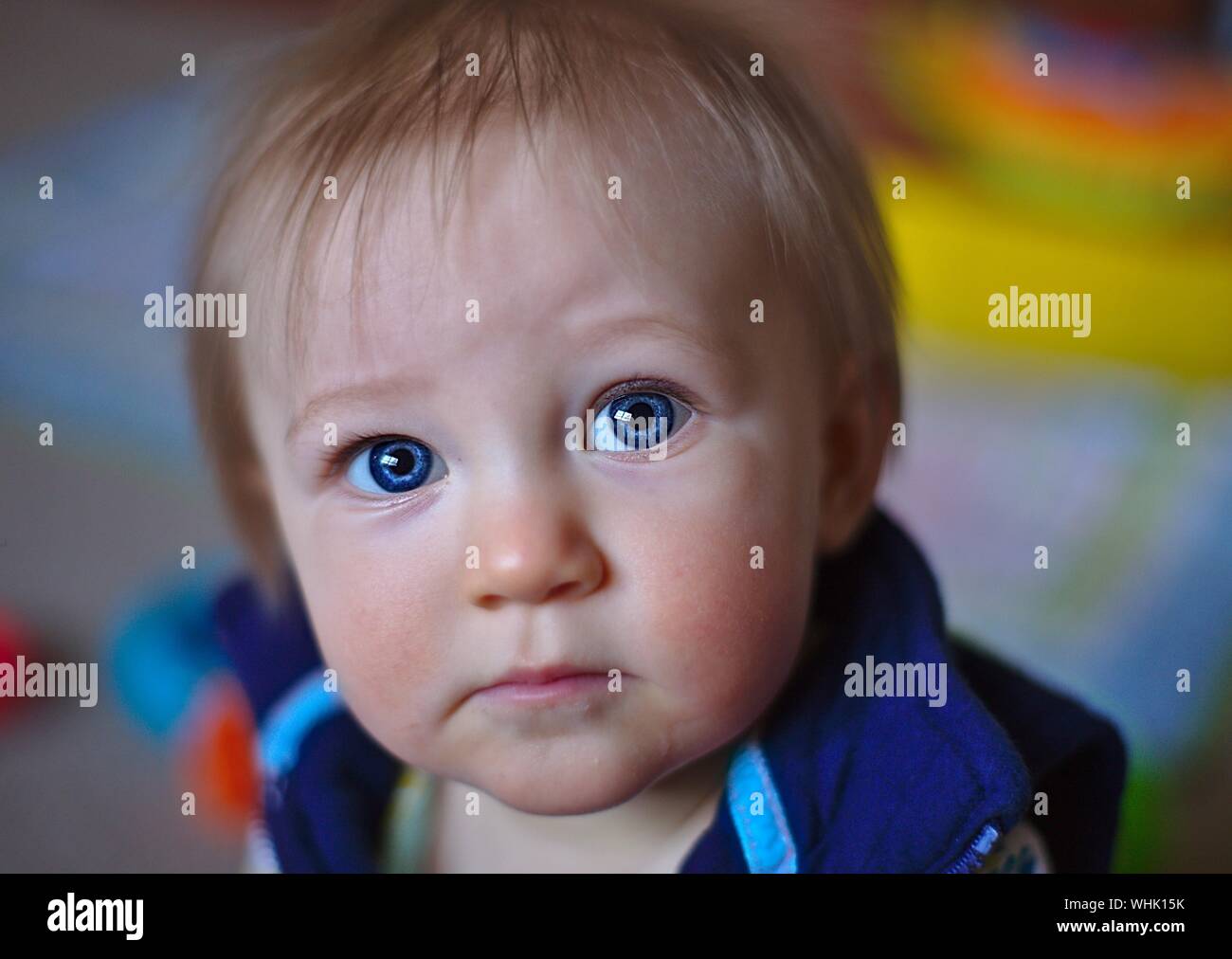 Baby girl with blue eyes hi-res stock photography and images - Alamy