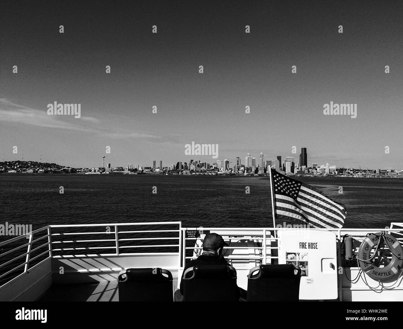 Rear view man american flag hi-res stock photography and images - Alamy