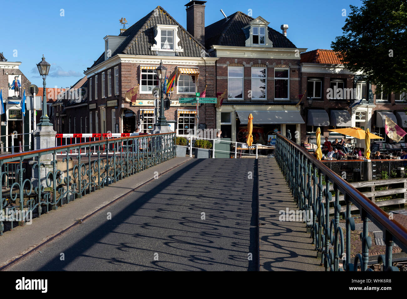 Opened rotating sluice gate bridge letting boats pass from the harbour ...