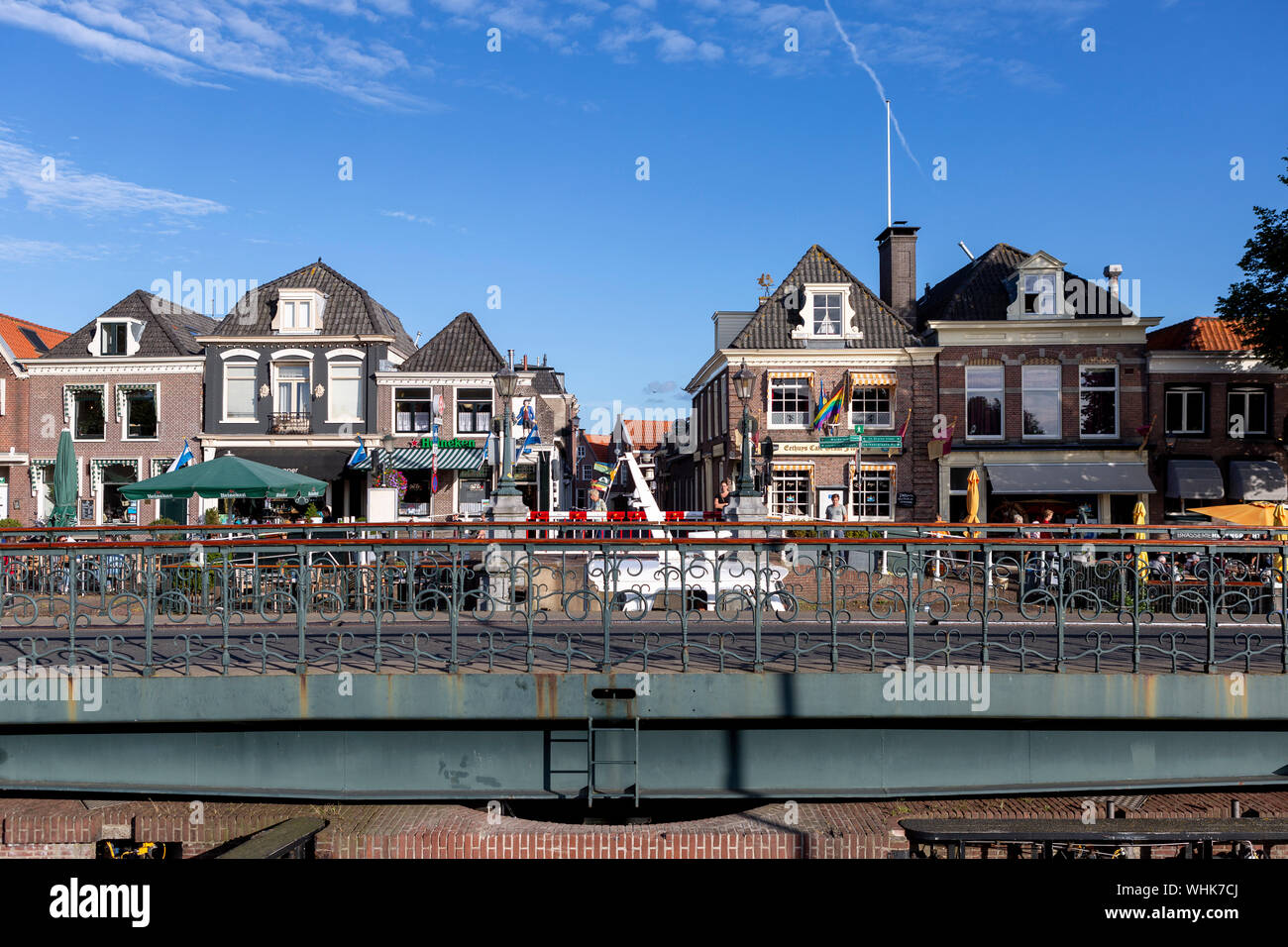 Opened rotating sluice gate bridge letting boats pass from the harbour ...